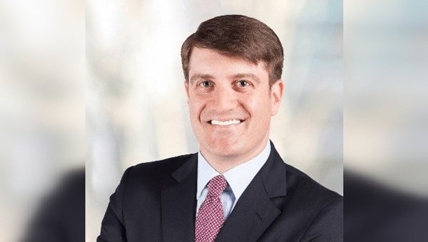 Q&A: AXS’s Greg Bassuk Talks the Long Inflation Game